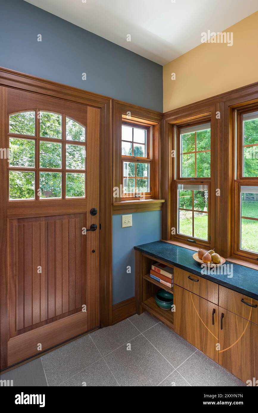 Back entryway to house with nice woodwork around windows and built-in ...