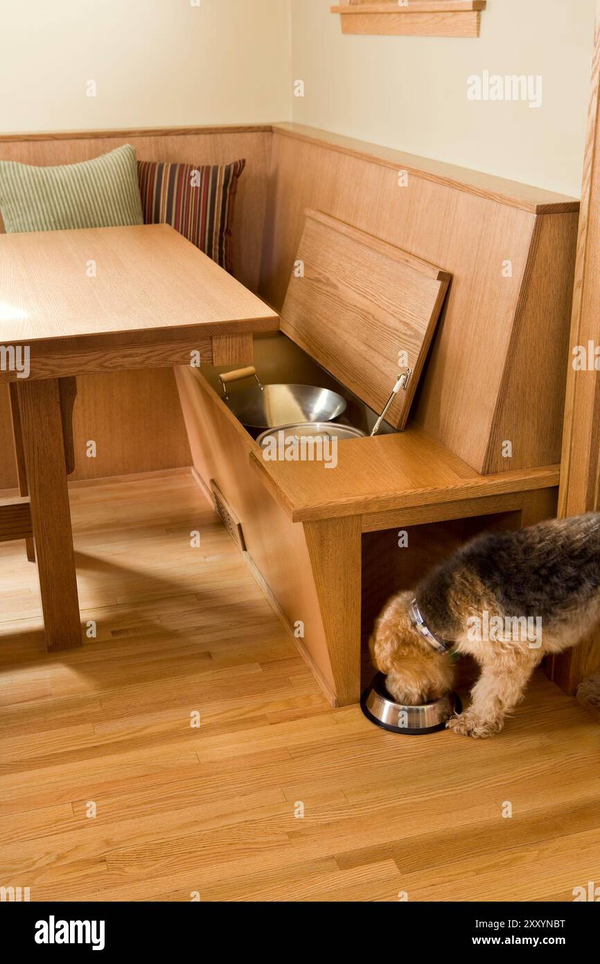 built in kitchen bench and table with dog at dish Stock Photo - Alamy