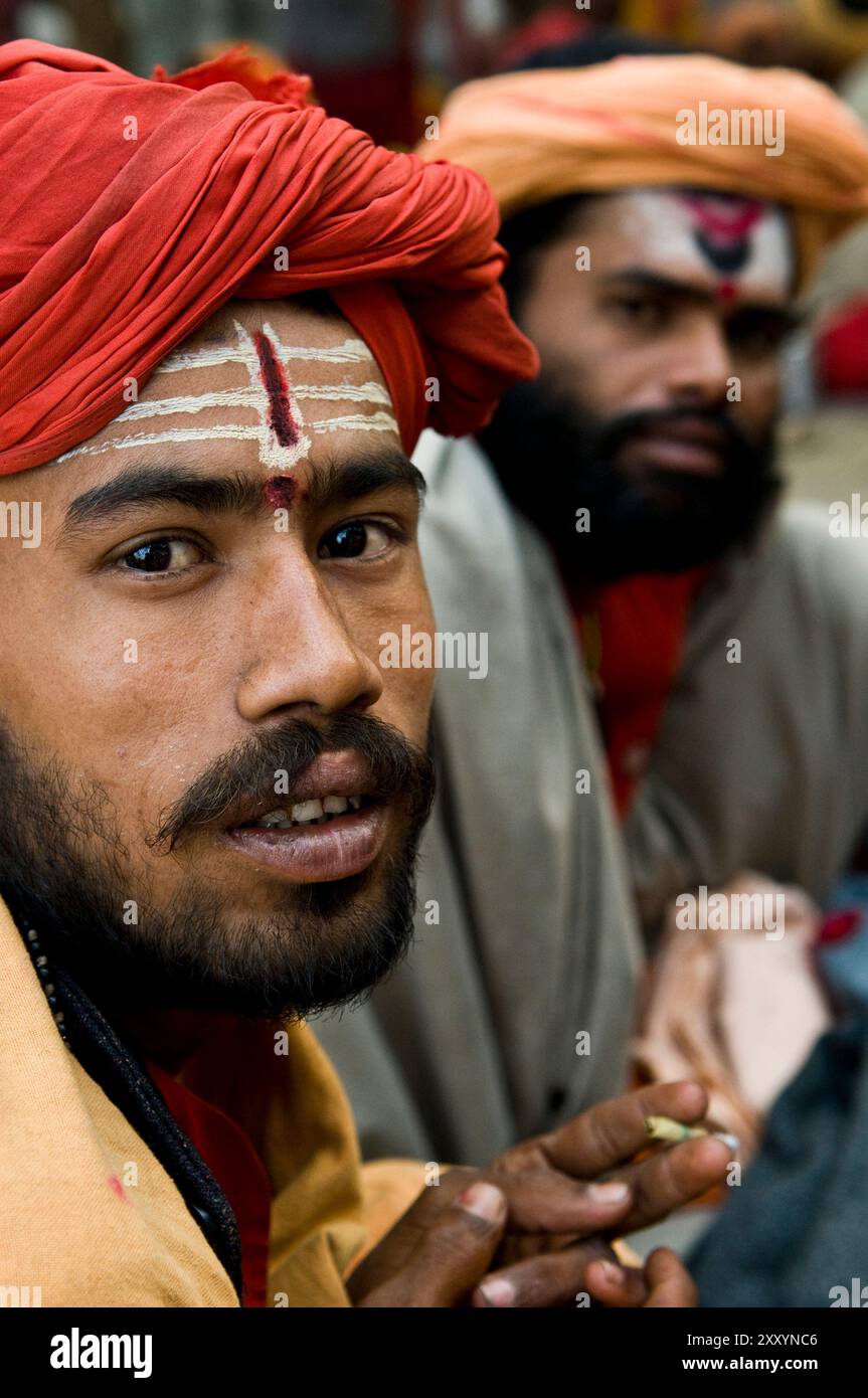 Sadhus gathered on the Mallick Ghat by the Hooghly river in Kolkata ...