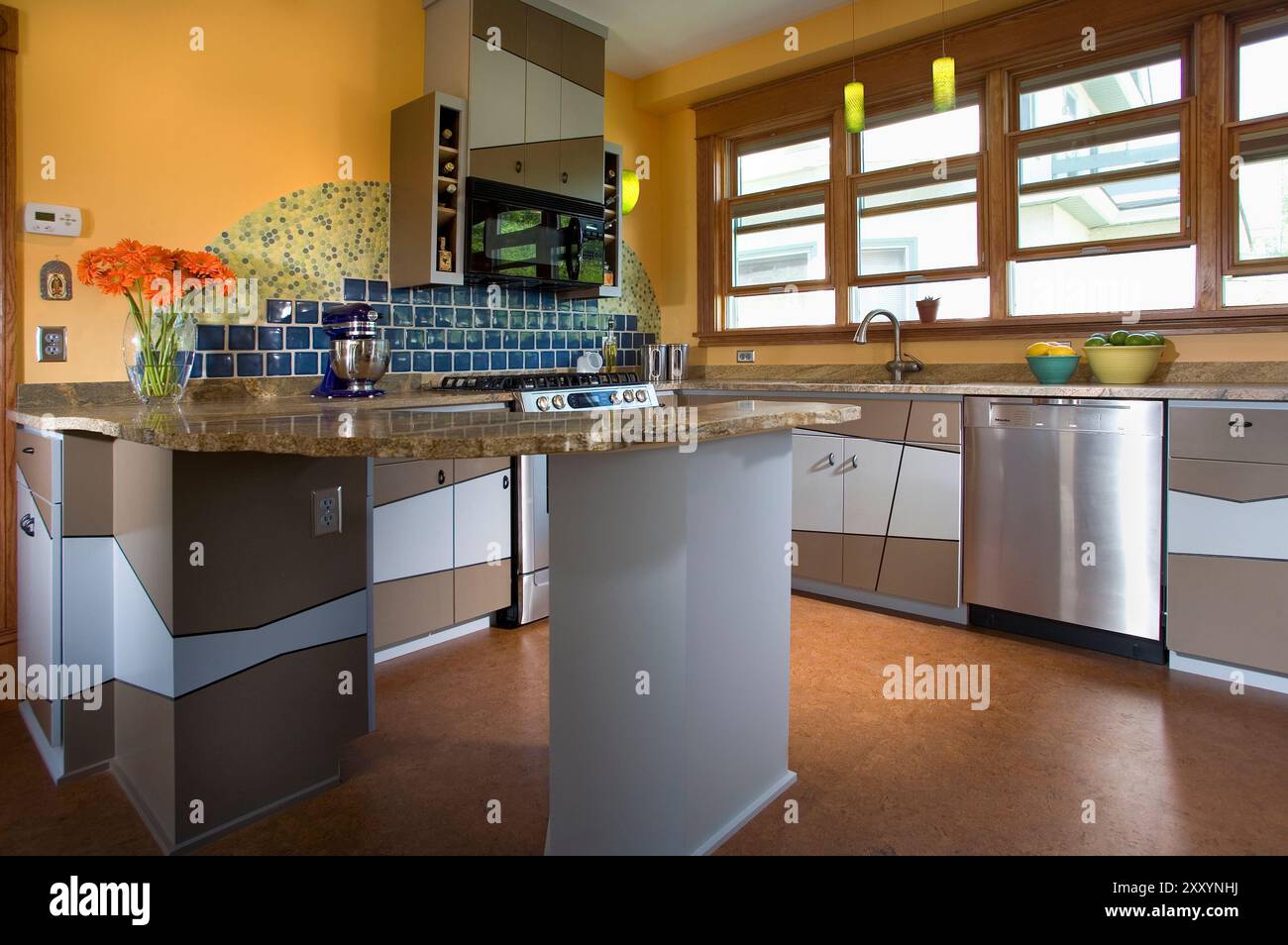 Low angle of kitchen cabinets shows modern design of lines and angles ...