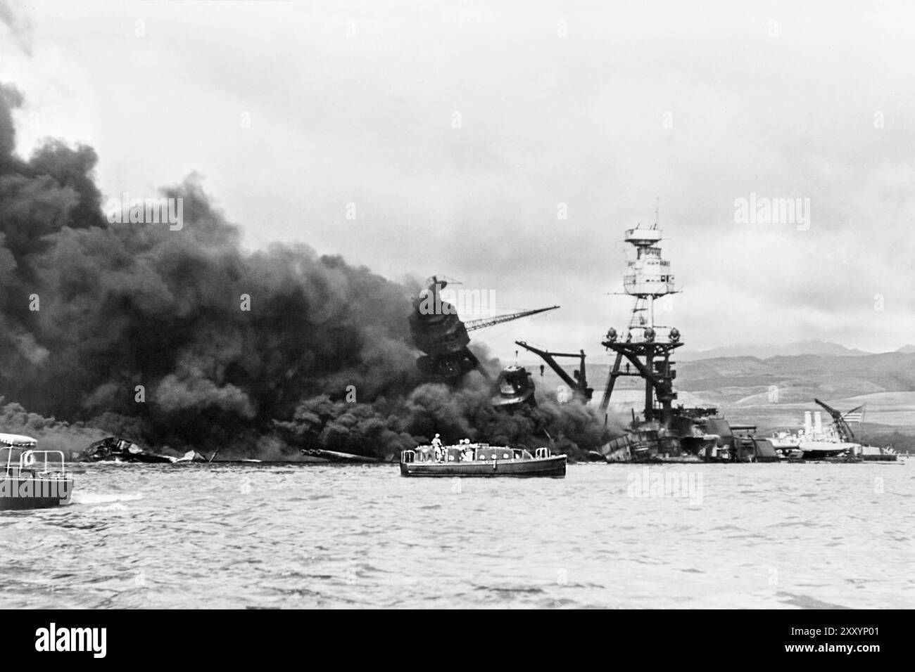 USS Arizona burning in Pearl Harbor after the aerial attack by the ...