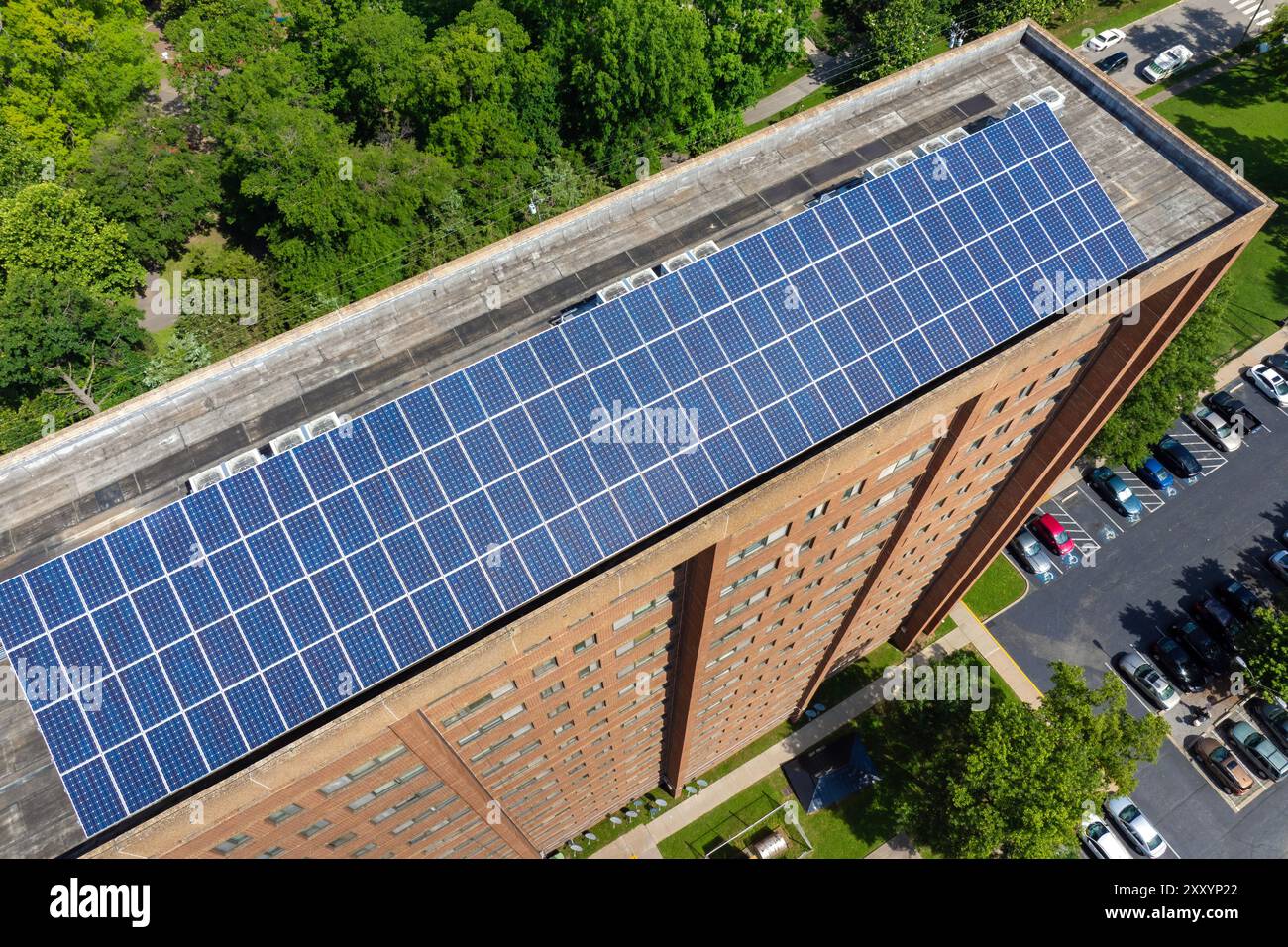 Solar photovoltaic panels installed on top of residential condo ...