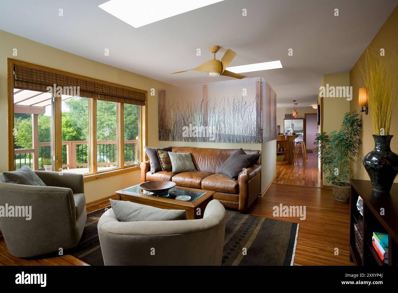 Sitting area/family room off of kitchen with 3Form wall divider Stock ...