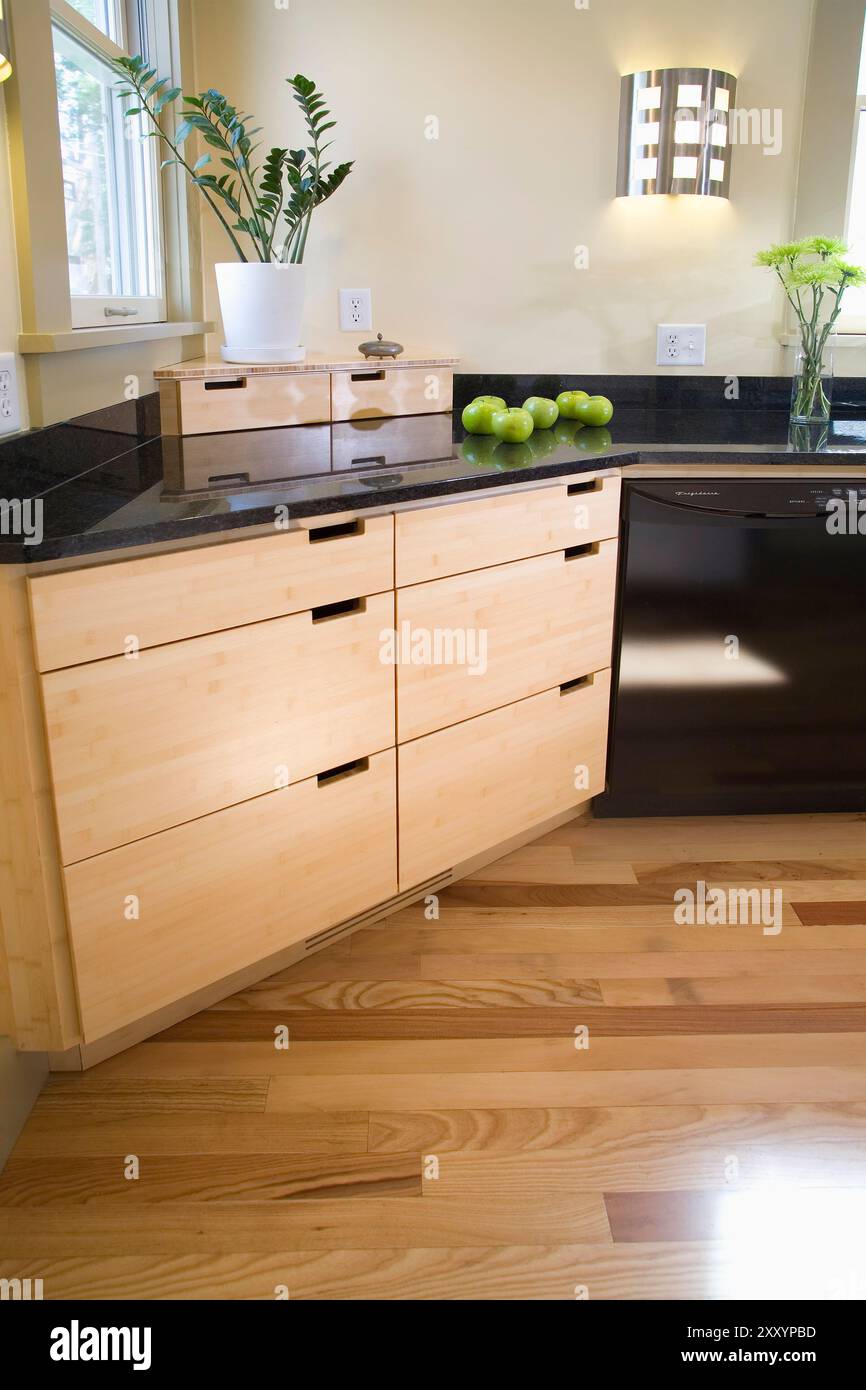 Detail of drawers and countertop in kitchen with bamboo cabinets - door ...