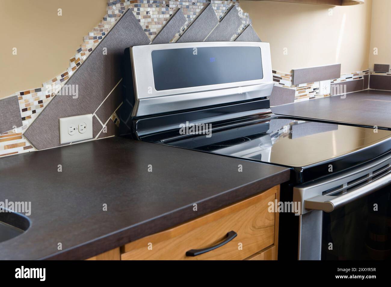 Unique kitchen counter backsplash made from mini glass tiles and ...
