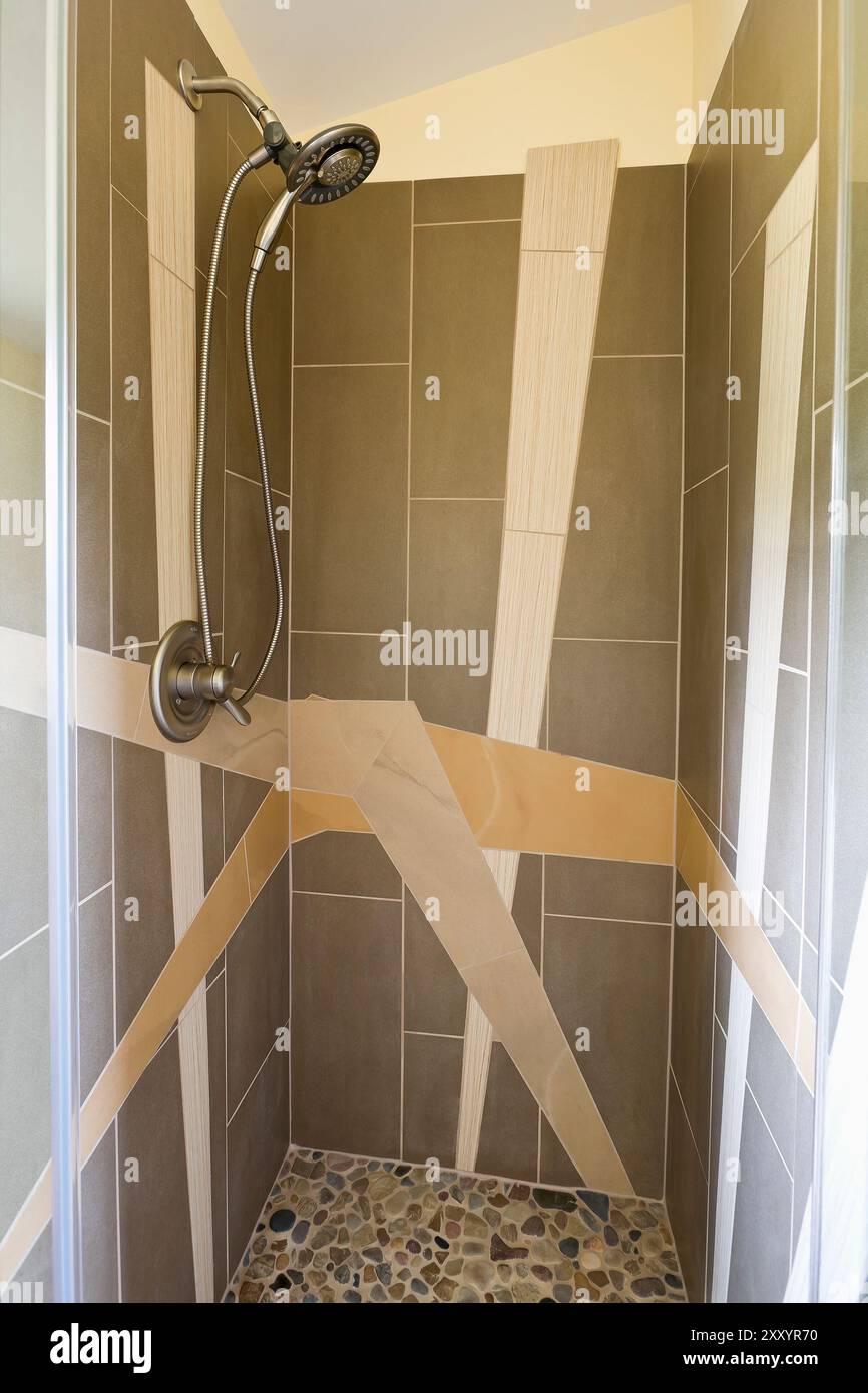 Modern funky shower with interesting angles and design of tile Stock ...
