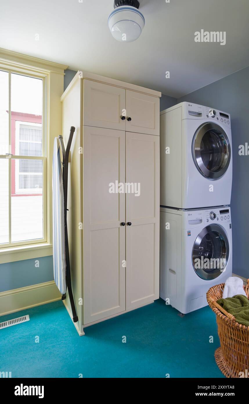 Colorful remodeled laundry room in Victorian house Stock Photo - Alamy