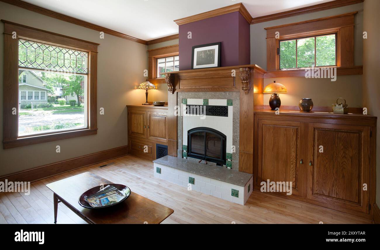 Newly refurbished woodwork and built-in cabinets in remodeled living ...