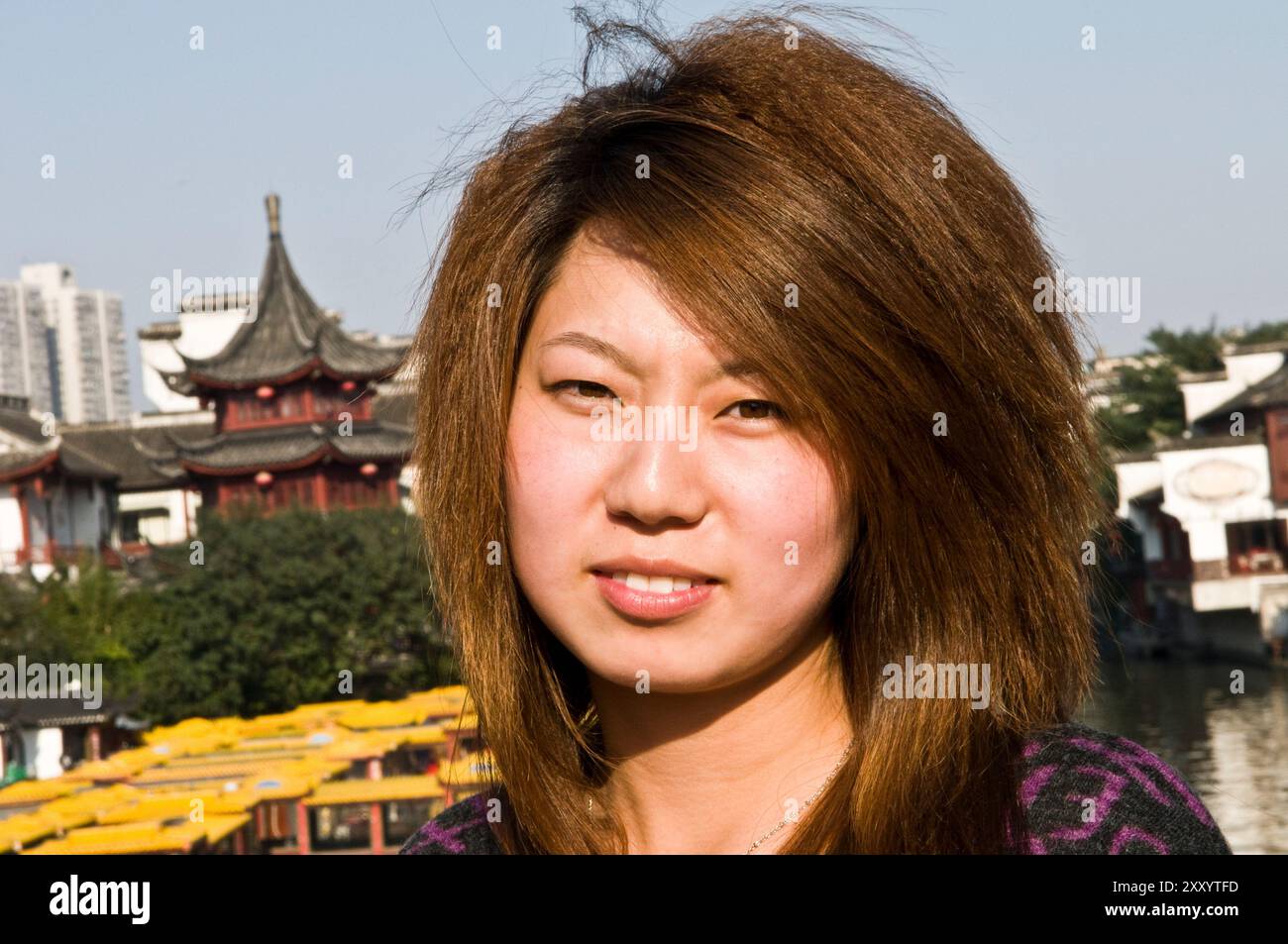 Portrait of a young Chinese woman taken near the Fuzi Miao temple in ...