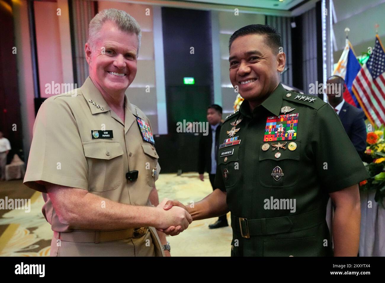 U.S. Indo-Pacific Command Commander Admiral Samuel Paparo, left, and ...