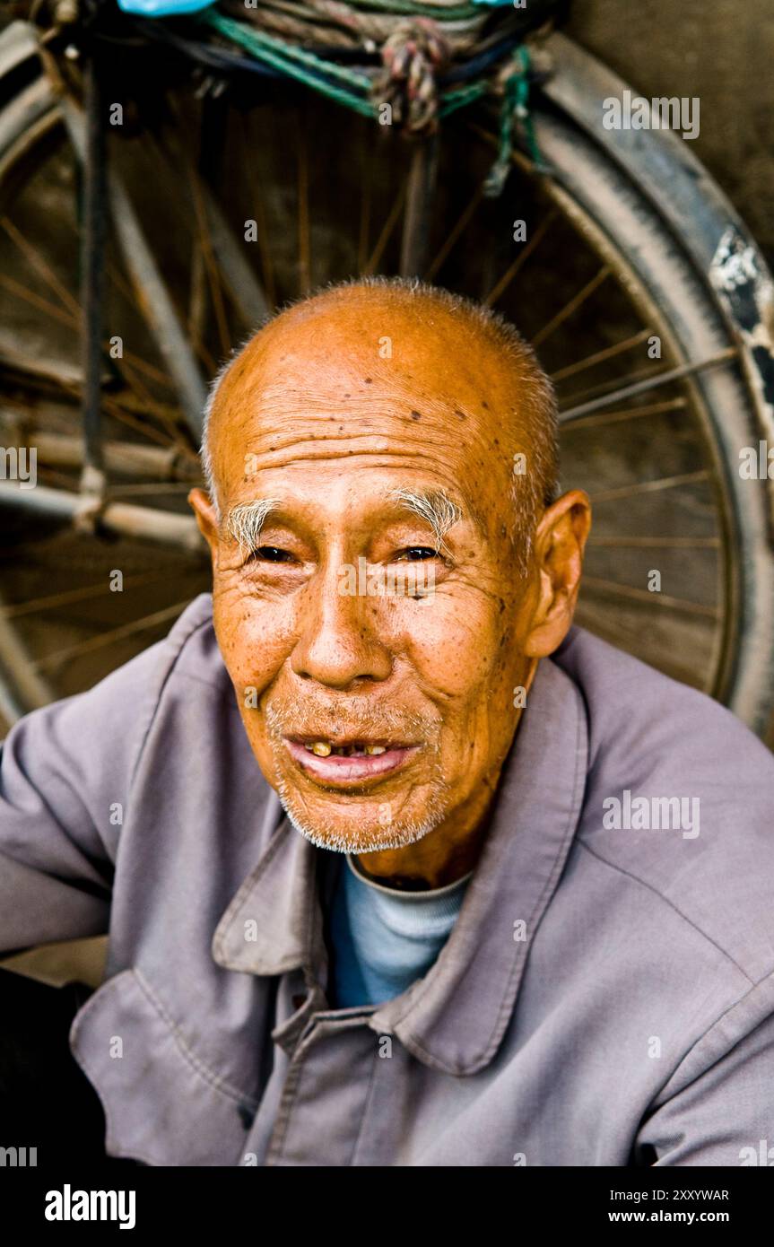 Portrait of a Chinese man taken in Pingyao, China Stock Photo - Alamy