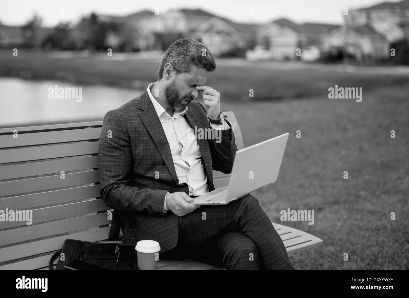 Bored upset tired business man in suit sitting on bench. Tired ceo ...
