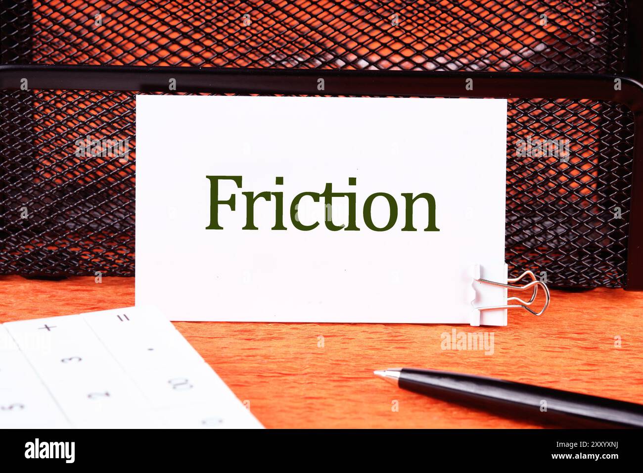 Friction concept. Friction word on a white business card close-up Stock ...