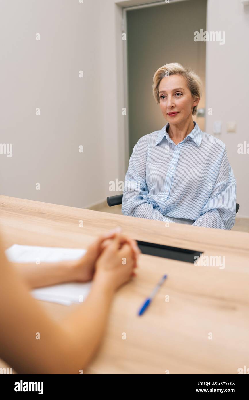 Rear view female applicant hi-res stock photography and images - Alamy