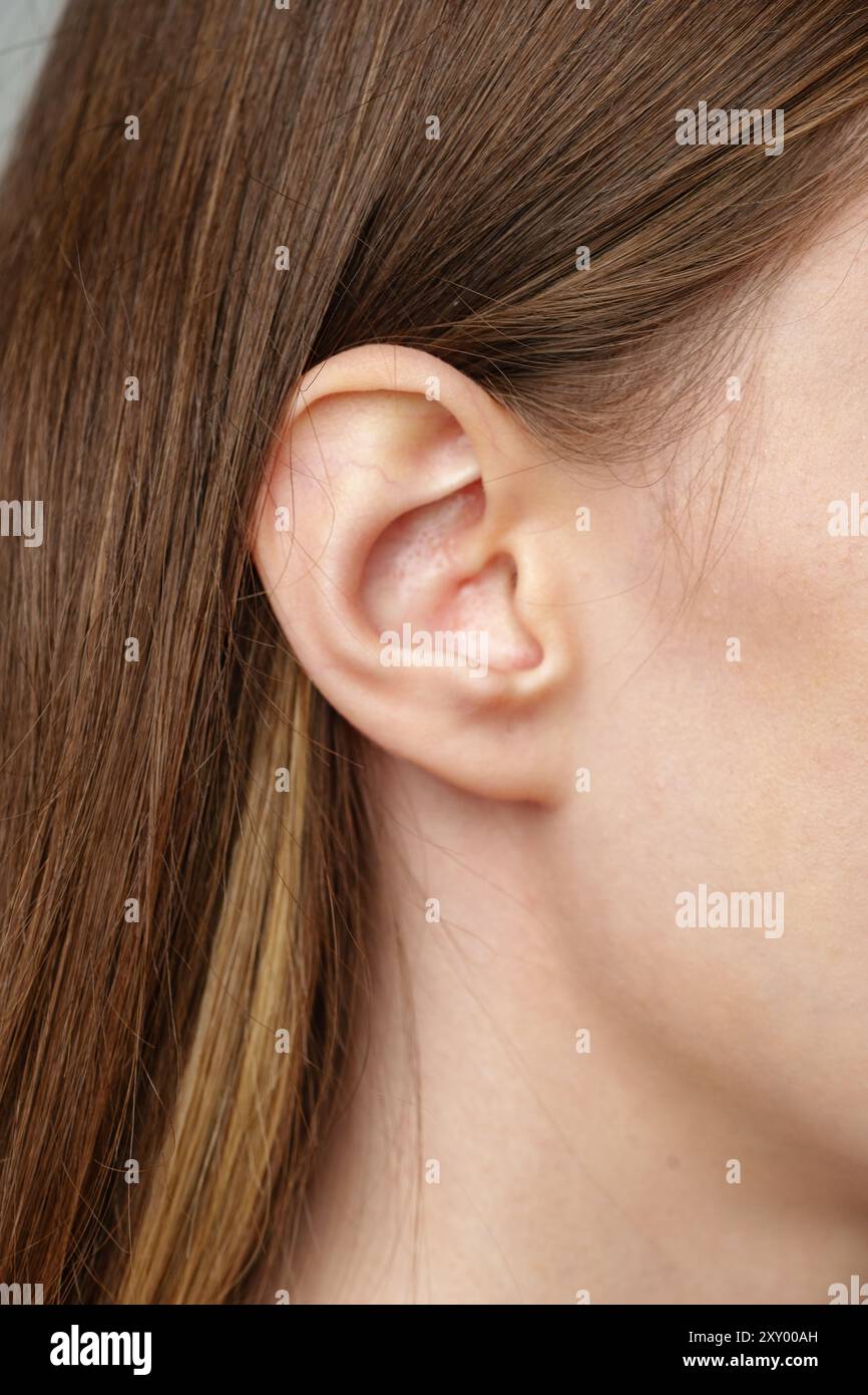 Womans ear detail hi-res stock photography and images - Alamy