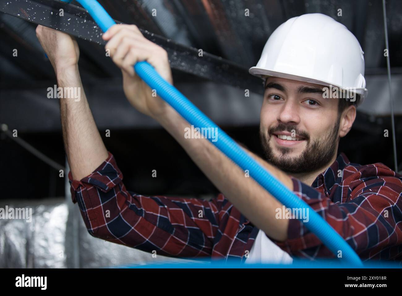 Team workers installing wall hi-res stock photography and images - Alamy