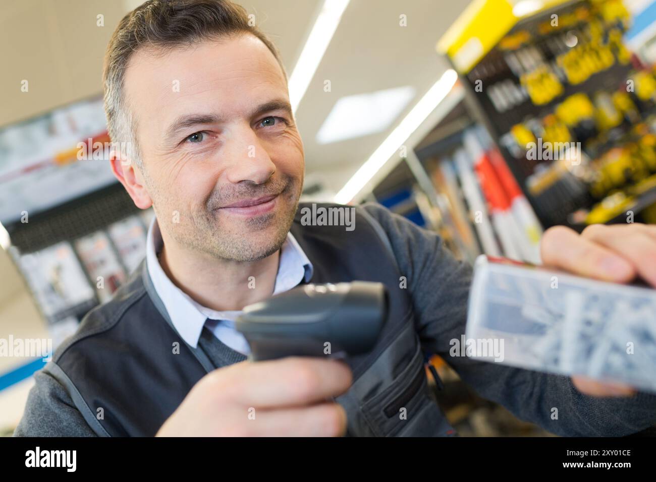 Cheerful courier smiling camera hi-res stock photography and images - Alamy