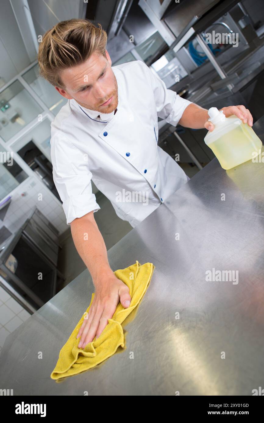 a chef cleaning kitchen counter Stock Photo - Alamy