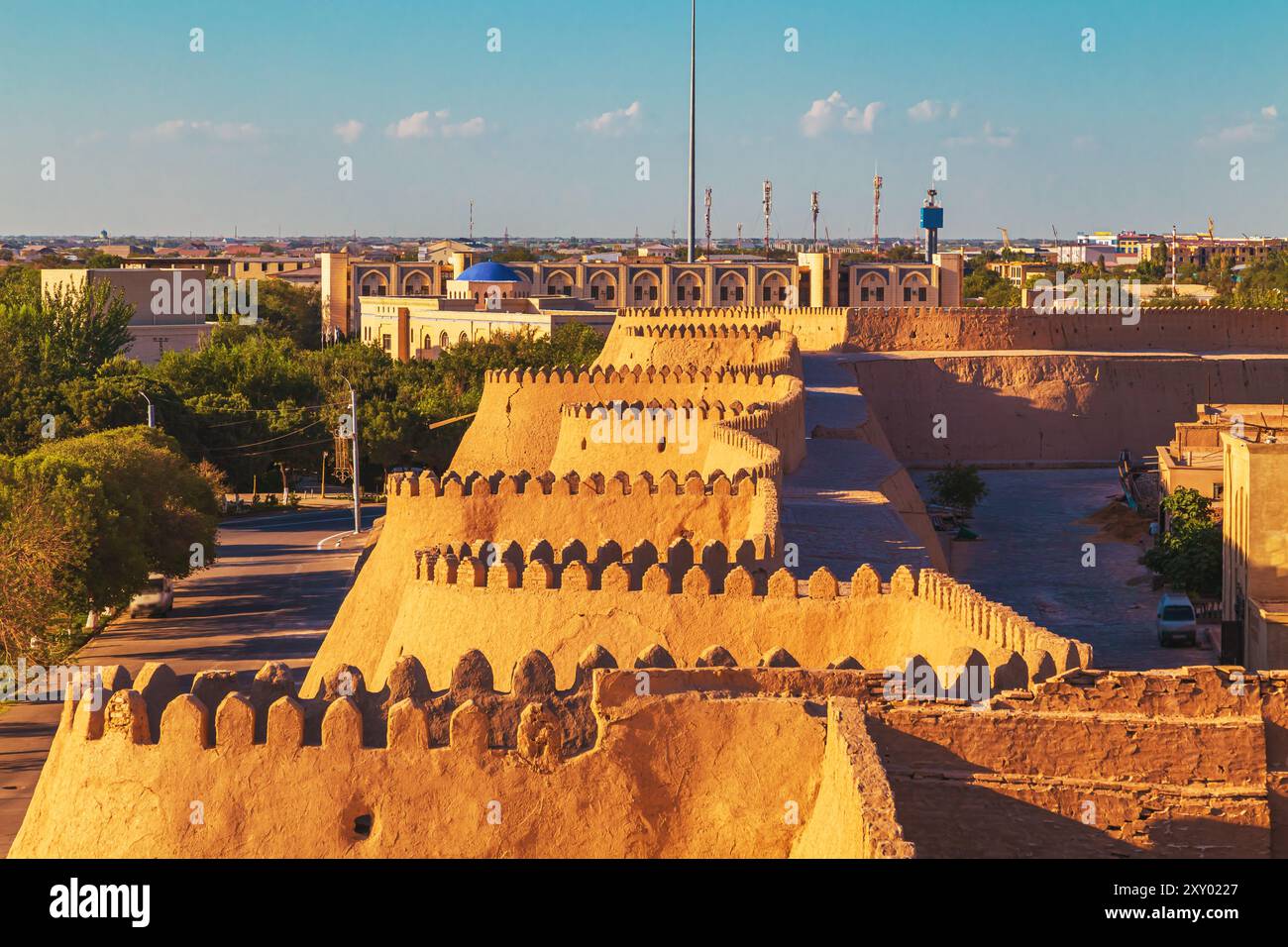 The city walls of the ancient city of Khiva at sunset. Khiva ...