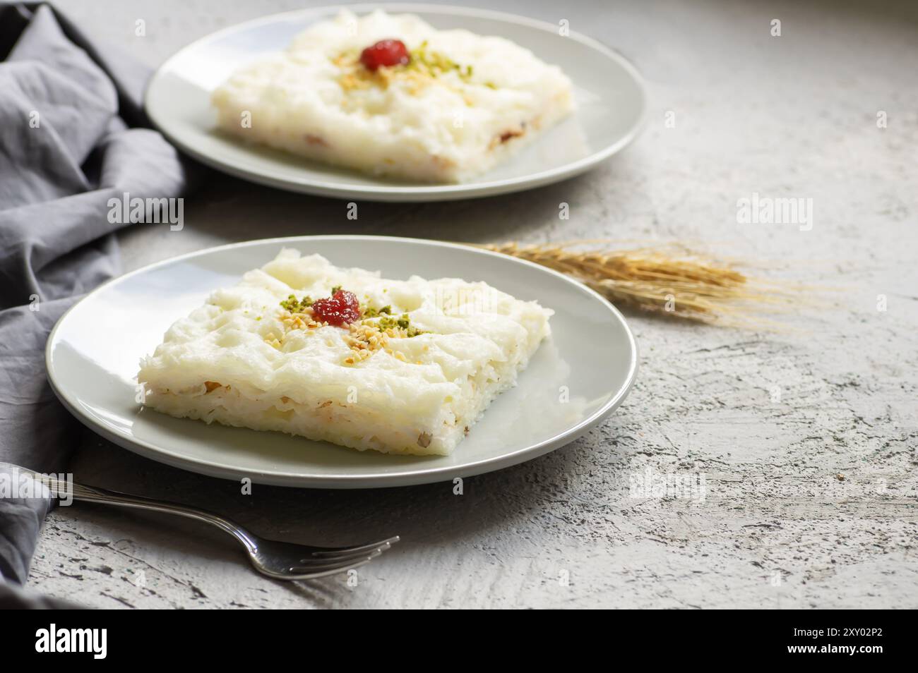 Traditional Turkish Ramadan dessert gullac, milky dessert with ...