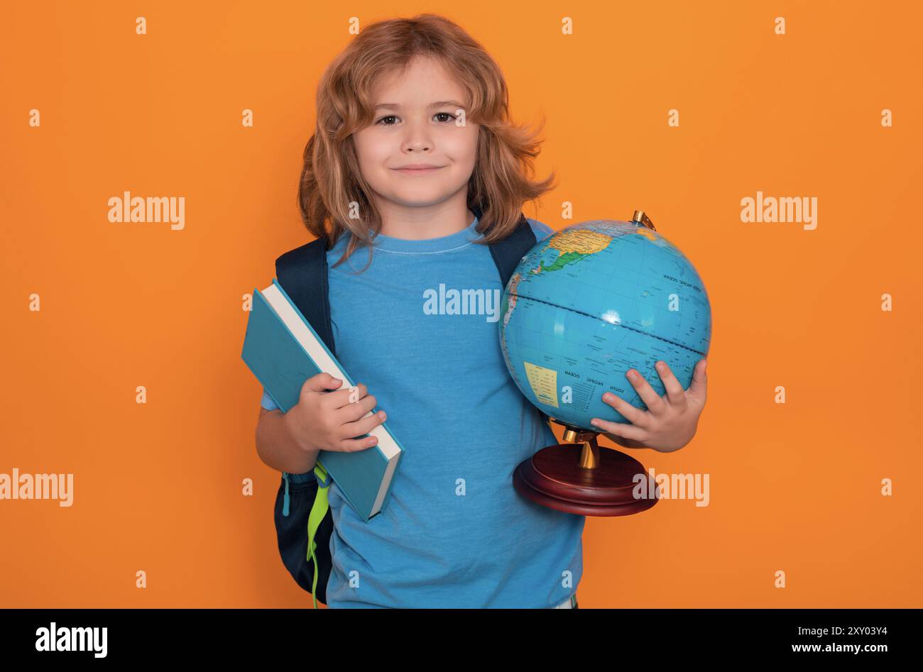 Knowledge day. School pupil with world globe and book. School kid ...