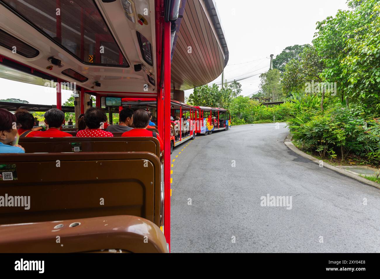 Visitors getting around quickly using in-park free ride shuttle ...