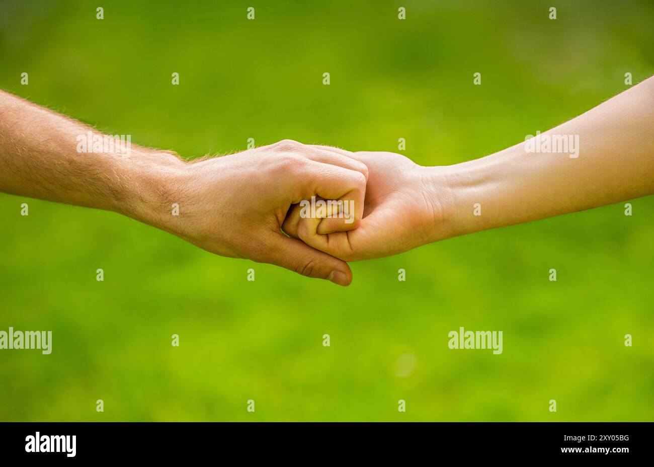 Friendly handshake, friends greeting, teamwork friendship. Rescue ...