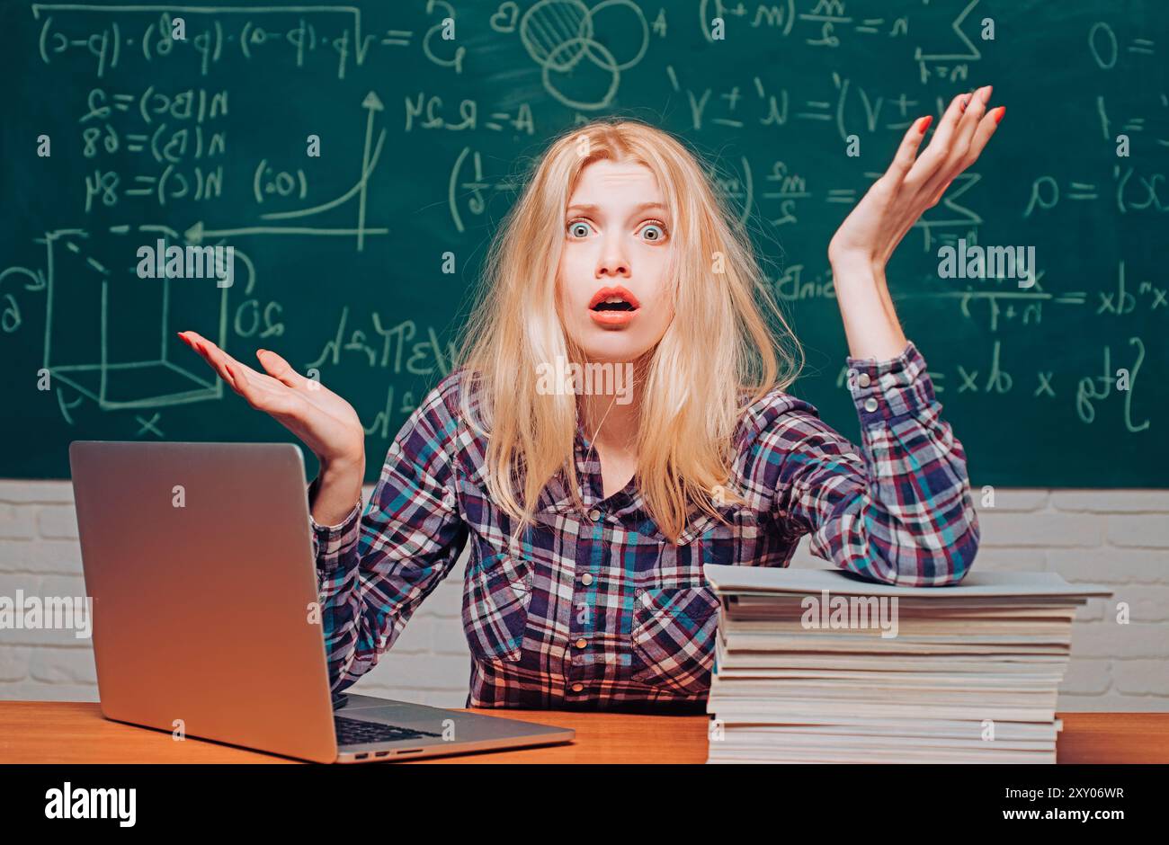 Emotional angry woman student screaming on classroom chalkboard ...