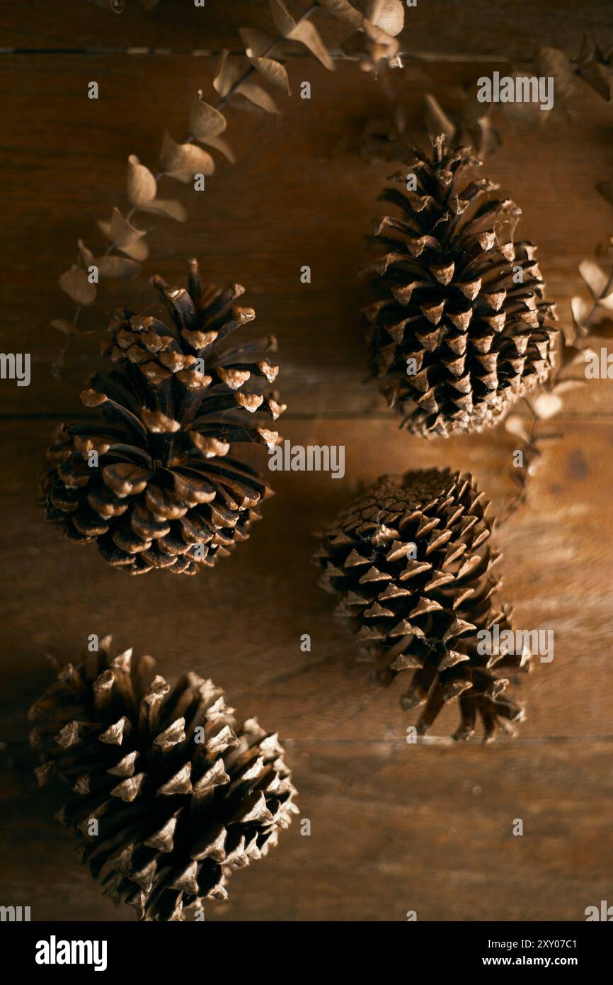 Close up pine cones on beige background, nature concept Stock Photo - Alamy