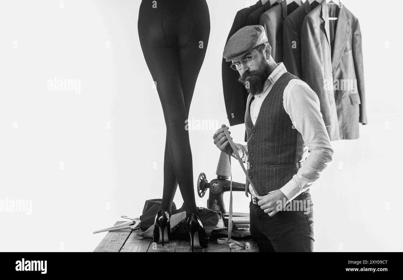 Sewing process. Male Dressmaker Sewing Female Clothing. Dressmaker ...