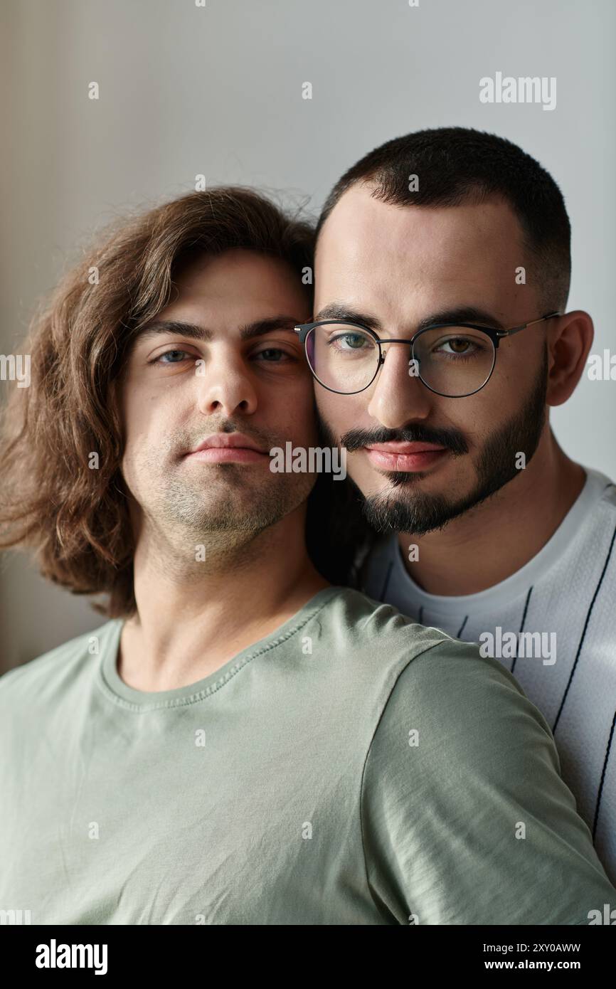 Two men share a tender moment, looking into each other's eyes Stock ...