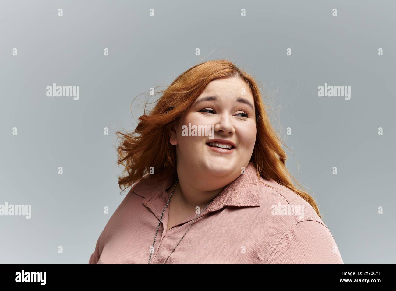 Young redhead woman smiles hi-res stock photography and images - Alamy