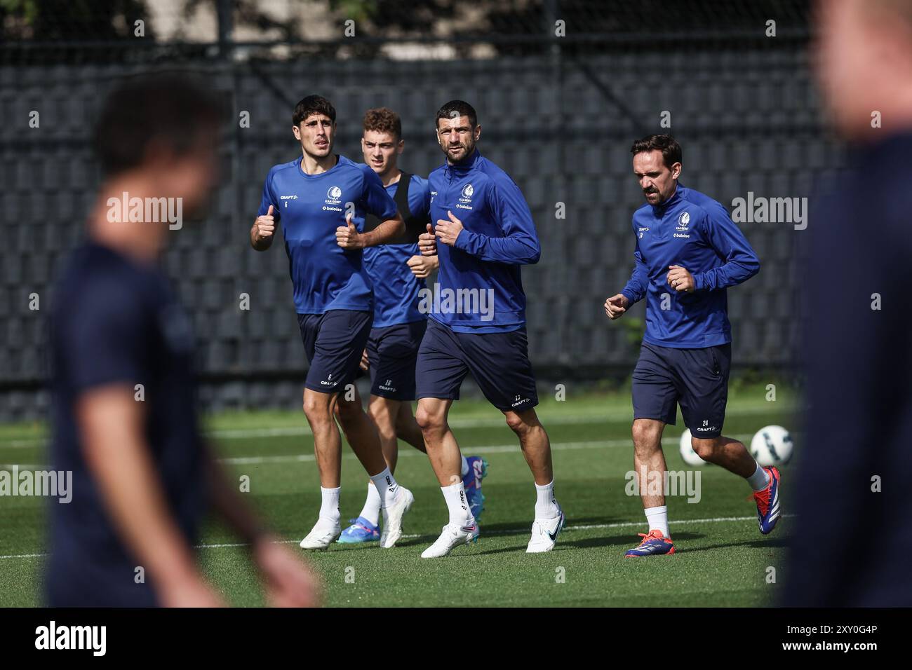 Gent, Belgium. 27th Aug, 2024. Gent's Omri Gandelman, Gent's Mathias ...