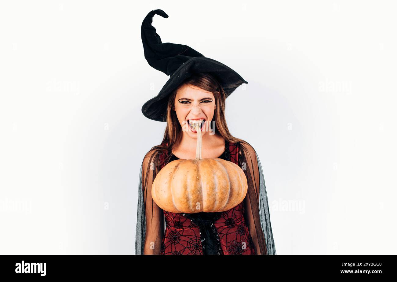 Beautiful surprised woman in witches hat and costume. Halloween Woman ...