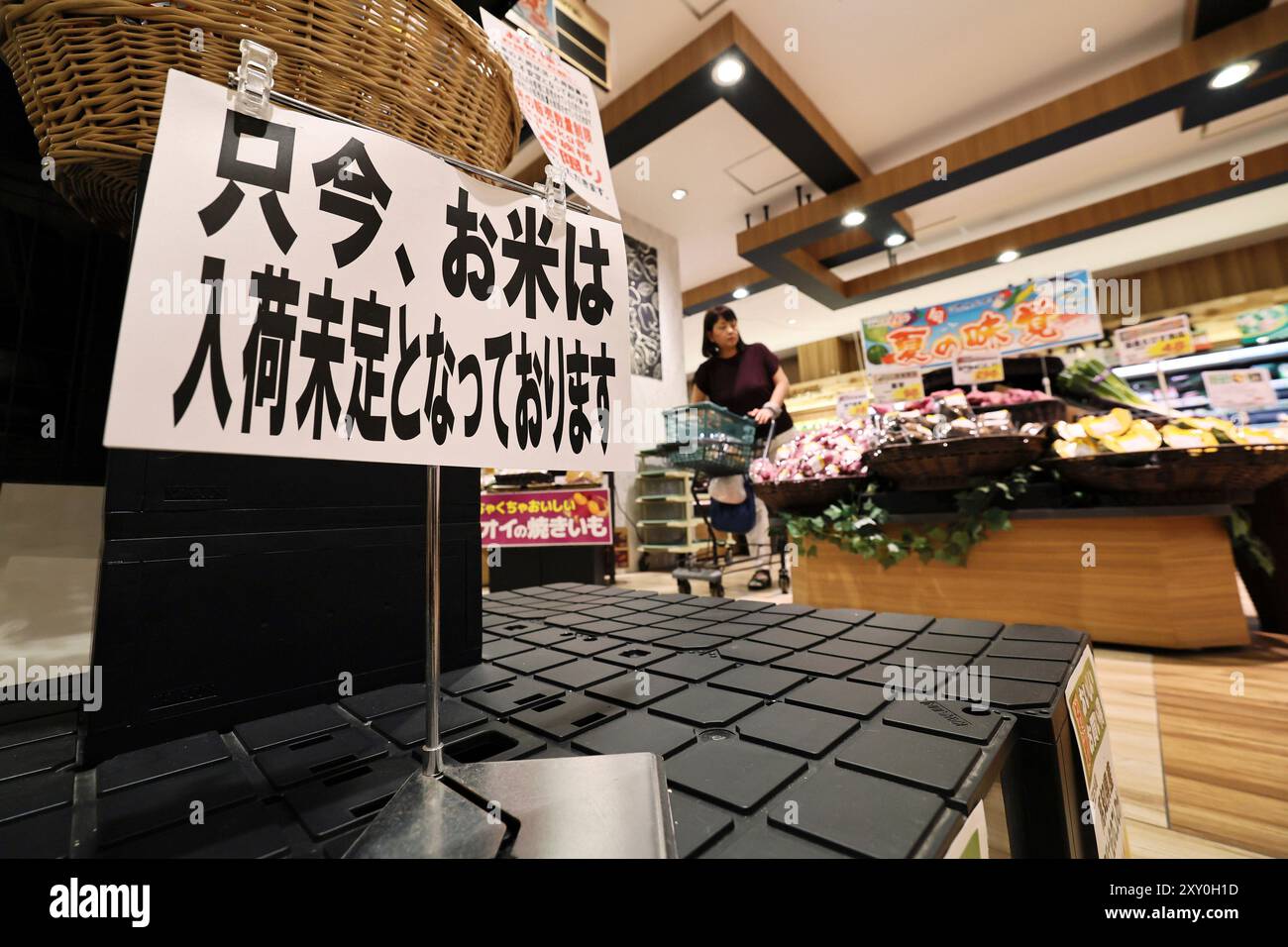 The photo shows a notice at a supermarket announcing the pending ...