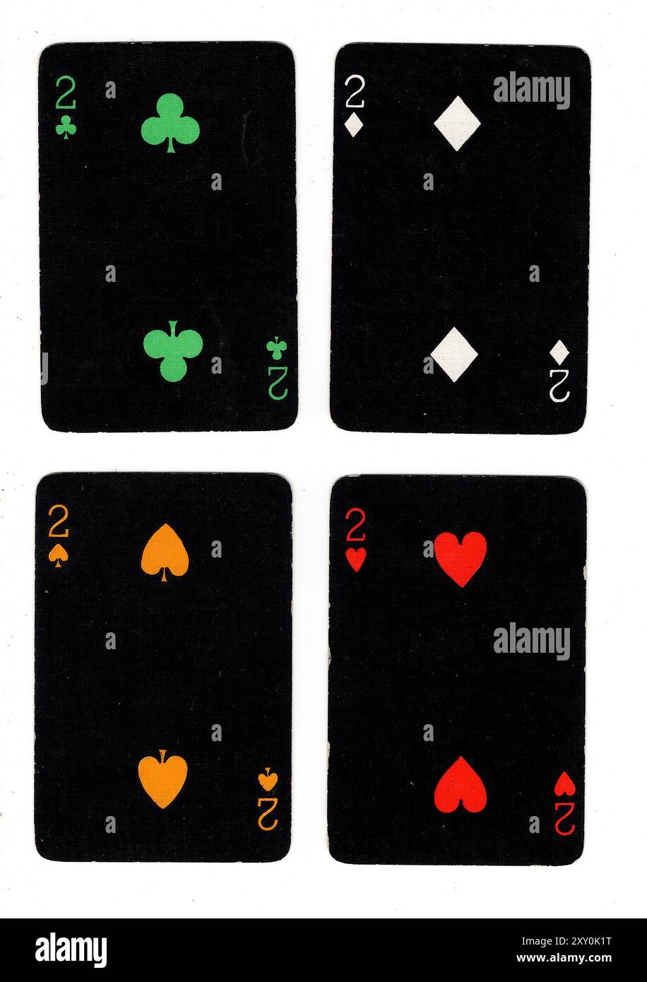 Vintage black playing cards showing four twos on a white background ...