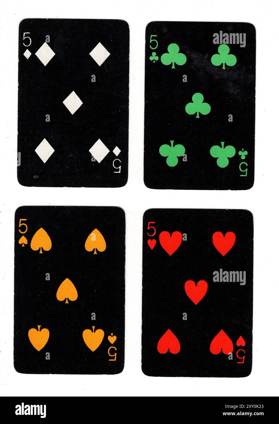 Vintage black playing cards showing four fives on a white background ...