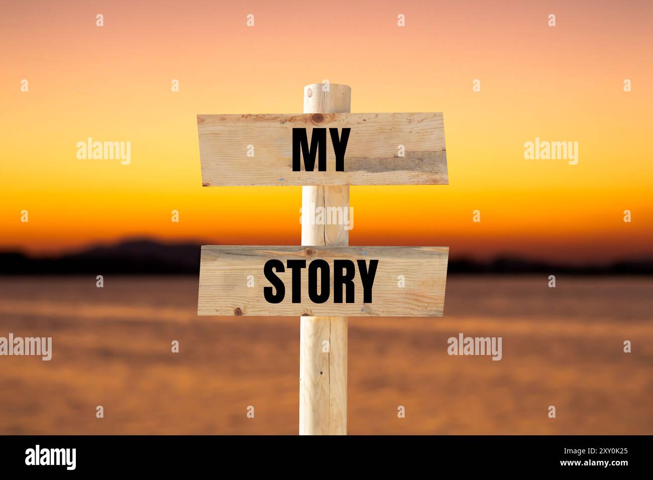 My story message written on wooden sign with blurry lake background ...