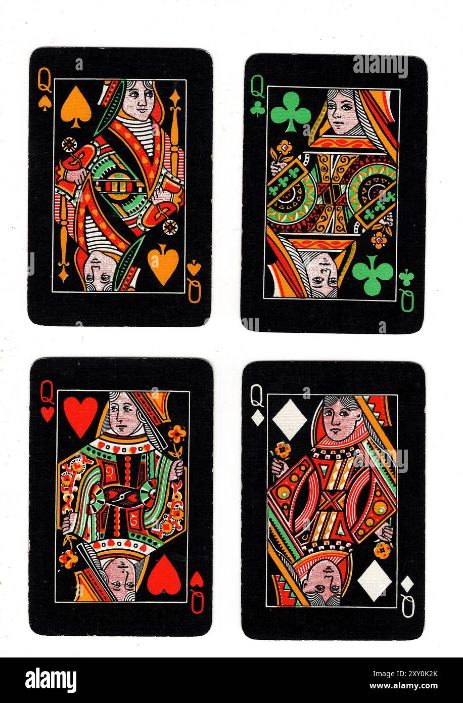 Vintage black playing cards showing four queens on a white background ...