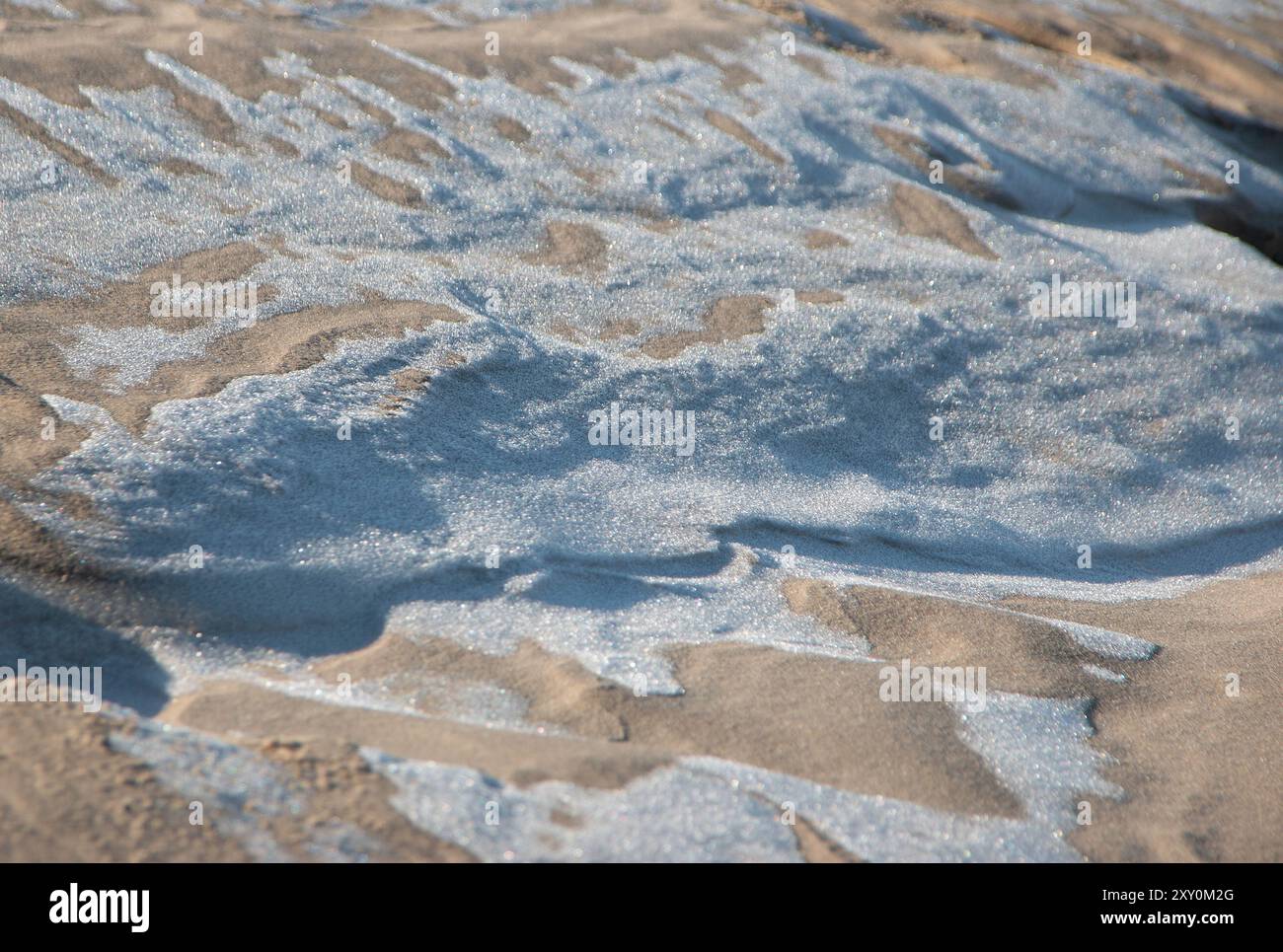 Sand and ice in Råbjerg Mile in Denmark Stock Photo - Alamy