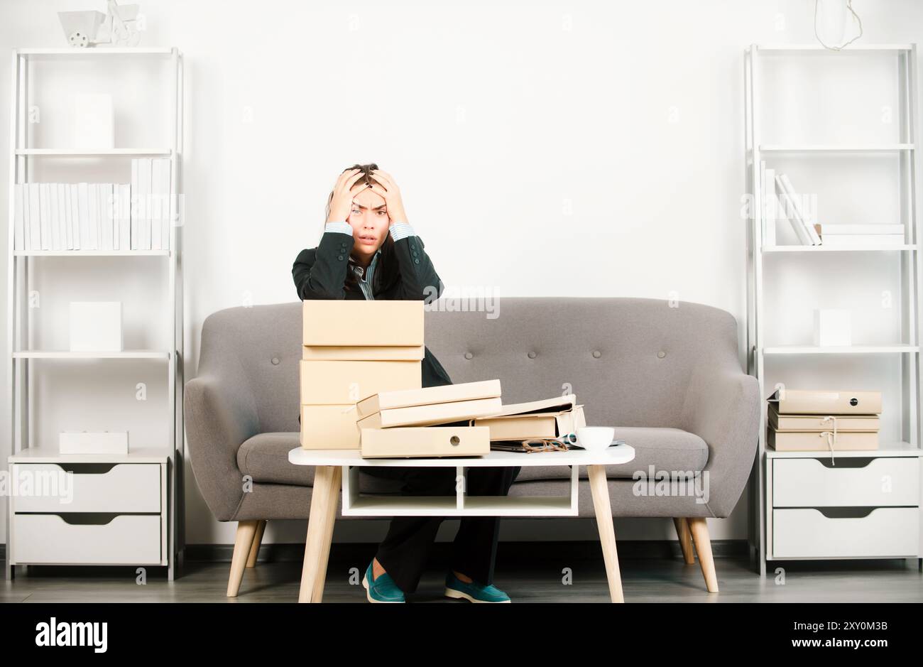 Upset business woman, unhappy secretary girl with folders with the ...