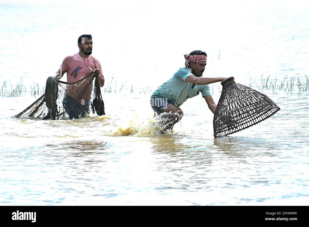 Indian boys fishing in river hi-res stock photography and images - Alamy