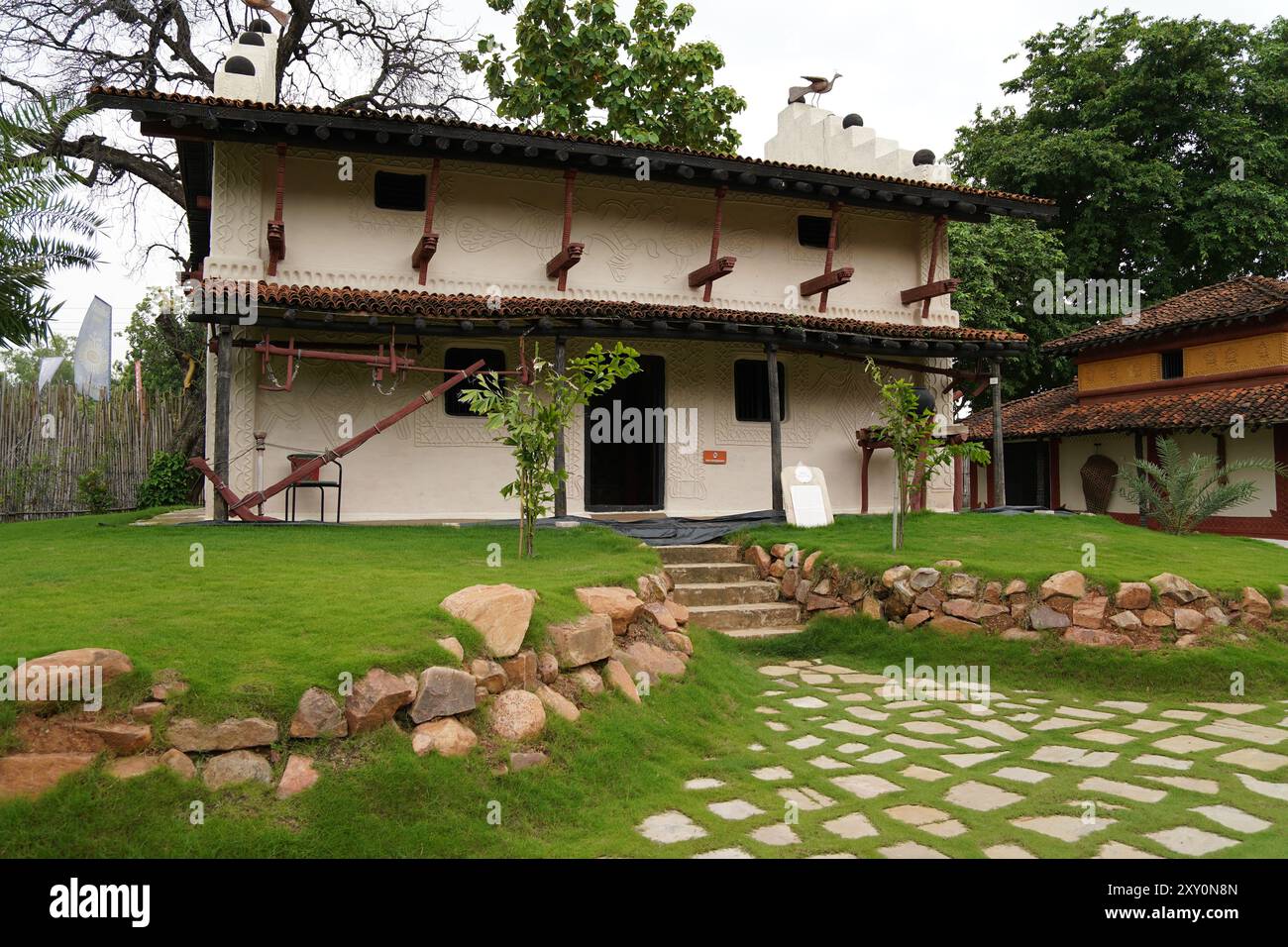 epresentative house of the Bhil. Cultural Village - AADIVART - State ...