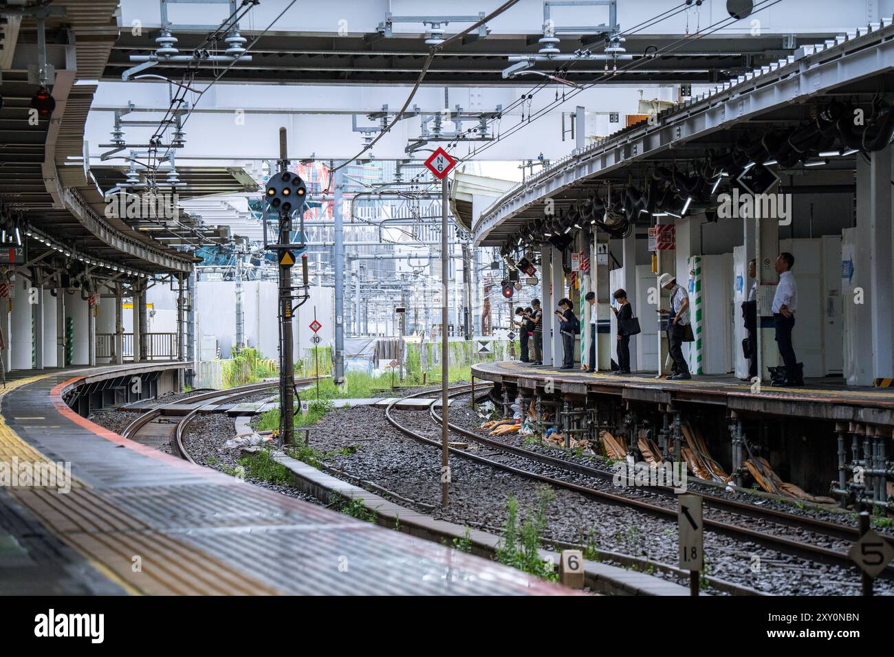 Busy Tokyo Train Platform - A bustling scene at a Japanese train ...