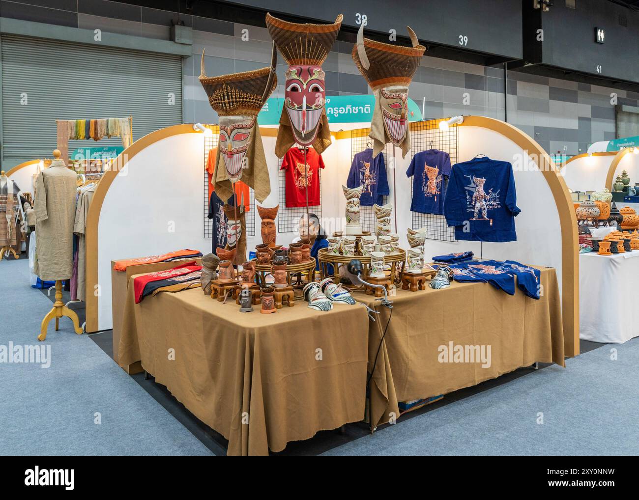 A view of a booth from Isan, Northeast Thailand, with Phi Ta Khon masks ...