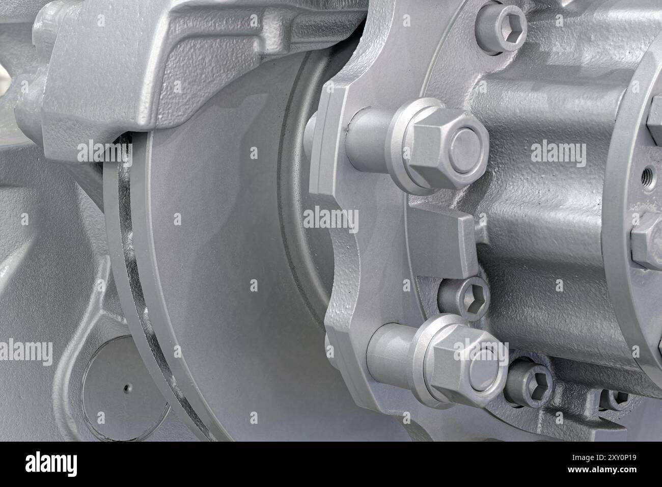 Car wheel hub and disc brake, close up shot. Abstract industrial ...