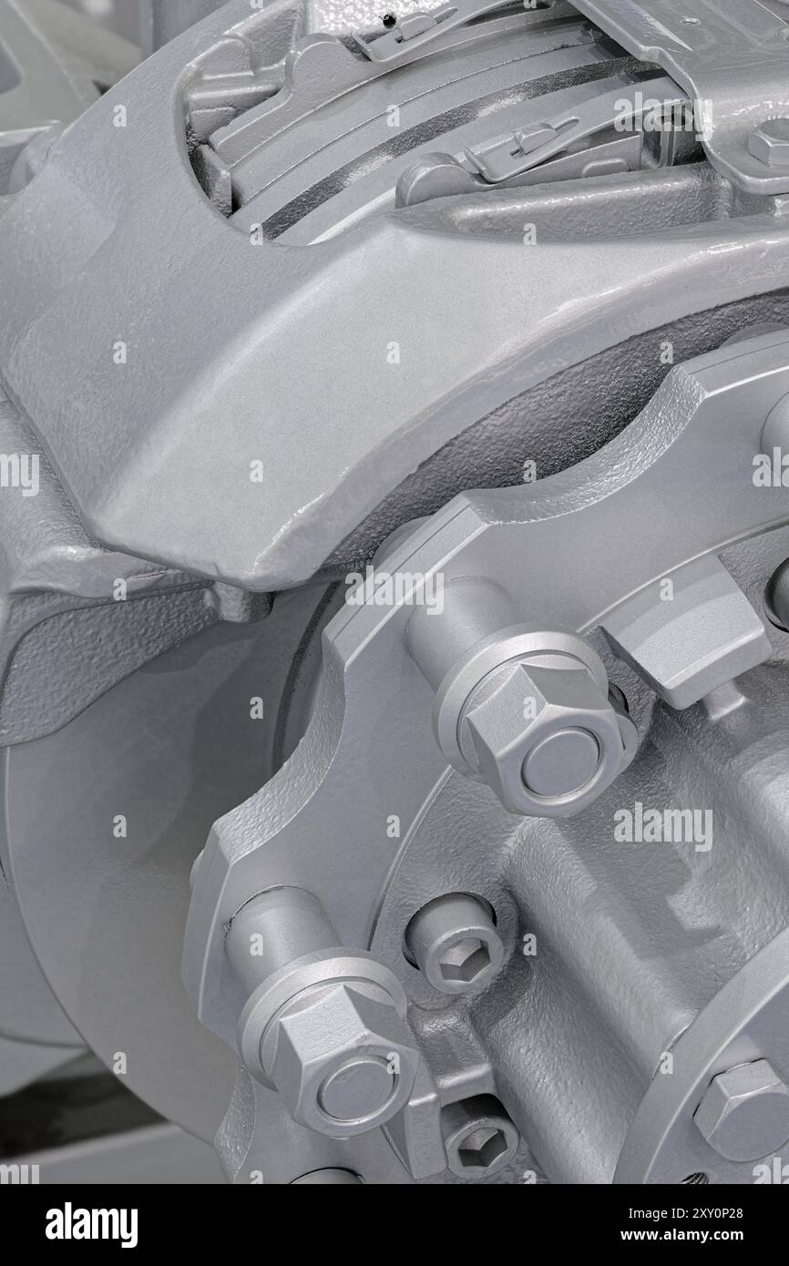 Car wheel hub and disc brake, close up shot. Abstract industrial ...