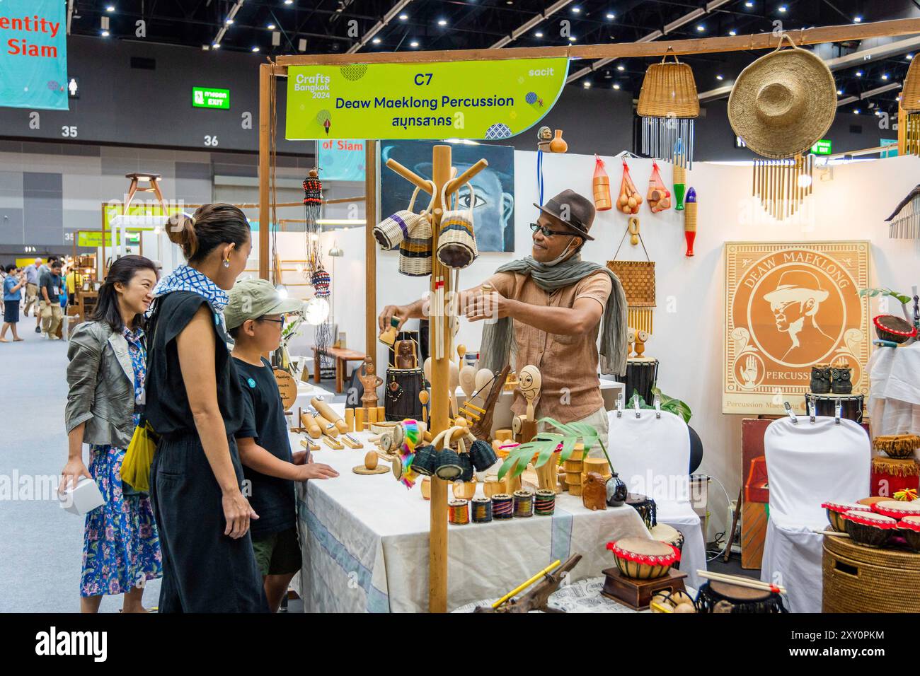 Bangkok, Thailand. 26th Aug, 2024. An exhibitor is seen entertaining ...