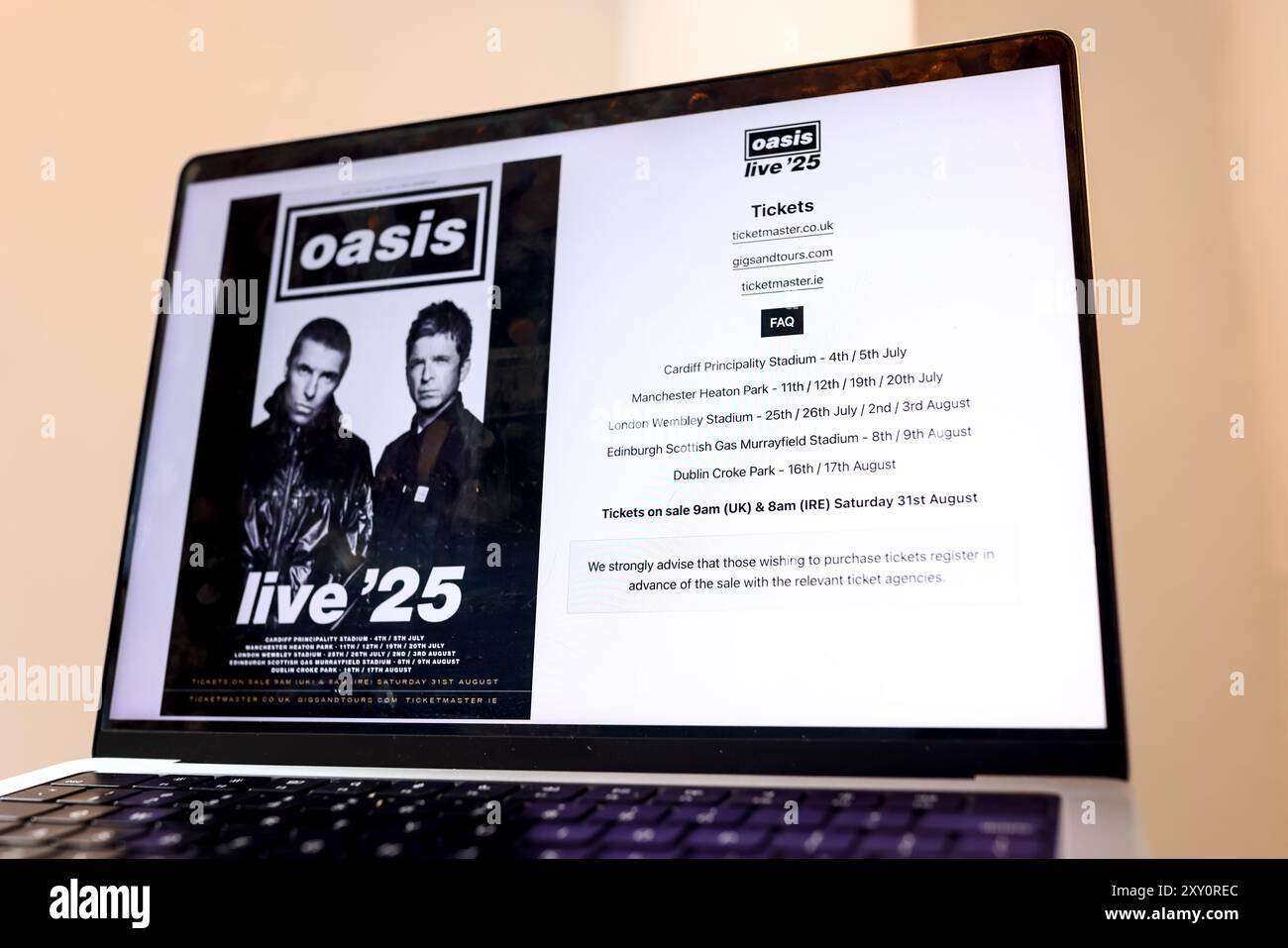The Oasis website, shown on a computer laptop screen, displays ...