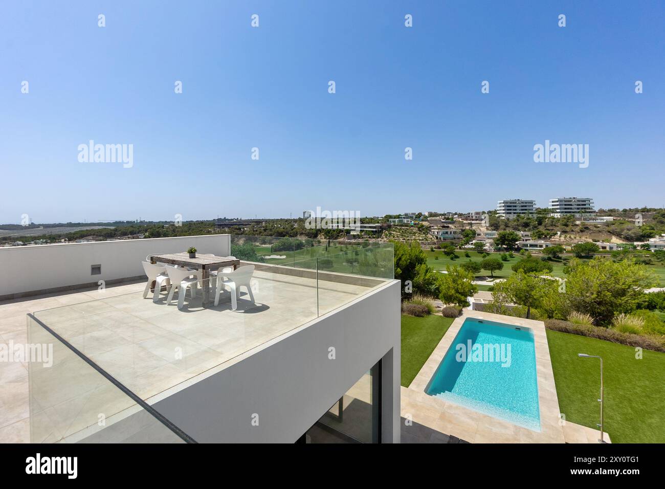 This stunning image showcases a rooftop terrace with a modern design ...